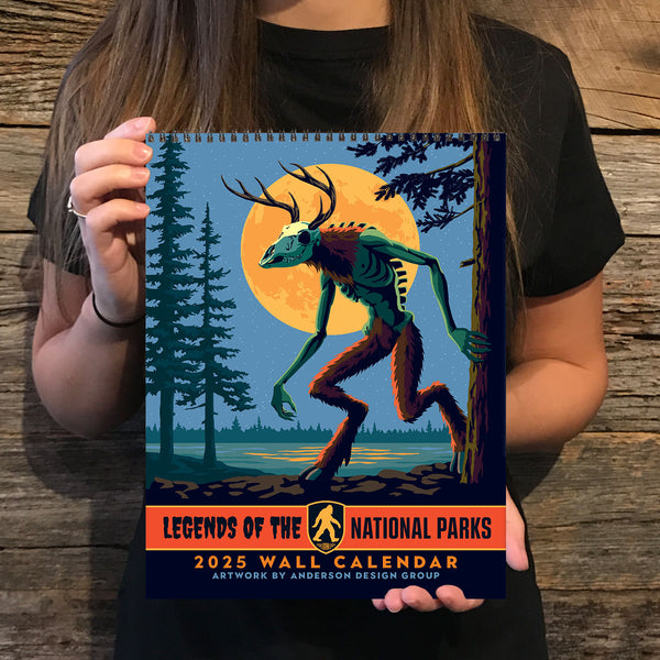 Woman holding our legends calendar